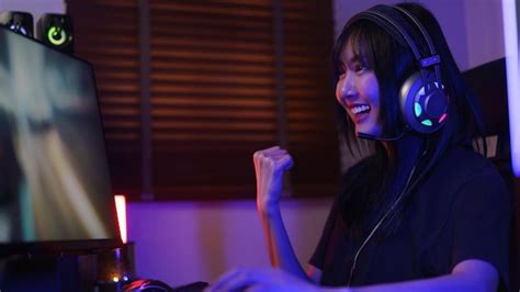 Premium Photo Female Cyber Hacker Gamer Watching Monitor And Making