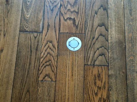 Hidden Ip4 Socket Is In Floor At Ground Level Hardwood Floors Stock