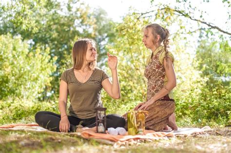 Master Massage Therapist Performs A Relaxing Massage In Nature Stock