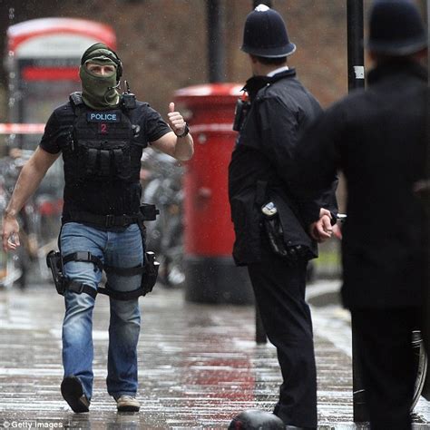 Tottenham Court Road Siege Suspect Stripped To His Waist And Led Away