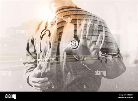 Double Exposure Of Success Businessman Using Smart Phone Digital Tablet Docking Smart Keyboard