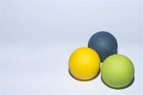 Three Different Colored Balls For Massage On Gray Stock Photo At Vecteezy