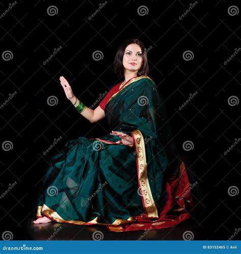 Indian Mood Sitting Beautiful Young Woman Posing In A Sari Dress