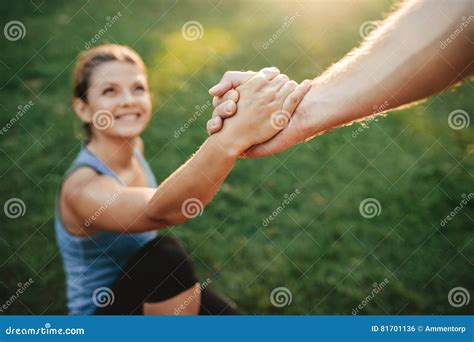Man Helping Woman To Stand Up Stock Photo Image Of Holding Support