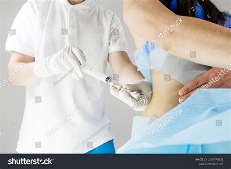 Doctor Giving Woman Injection Back Introduction Stock Photo Shutterstock