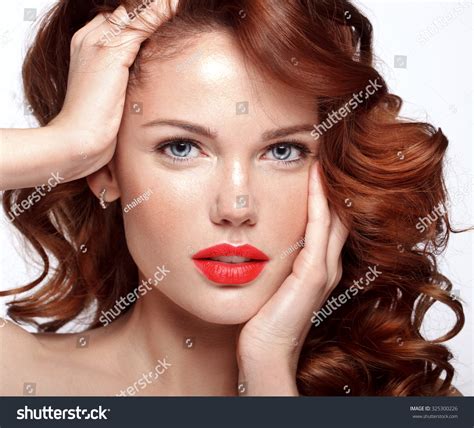 Beautiful Face Of A Fashion Model With Blue Eyescurly Hair Red Lips