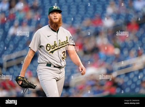 Oakland Athletics Relief Pitcher Aj Puk Walks On The Field During A