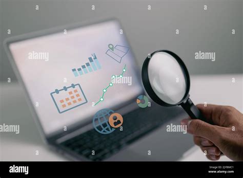 Smart Business Analyst With Magnifying Glass Scrutinizing Graphs