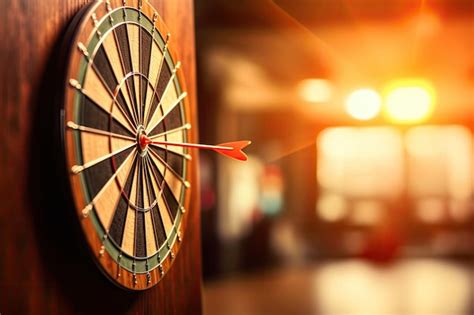 Premium AI Image Dart Arrow Hitting In Bulls Eye On Dartboard Goal