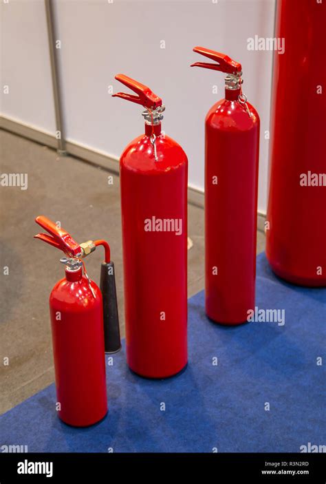 Different Size Of Fire Extinguishers Fire Fighting Device Stock Photo Alamy