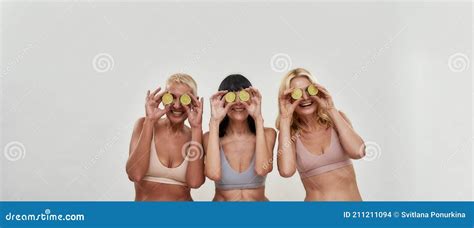 Women Having Good Fun Together With Lime Slices Stock Photo Image Of