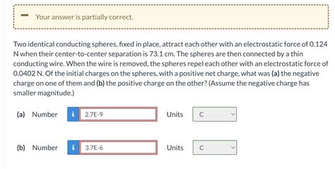 Solved Two Identical Conducting Spheres Fixed In Place