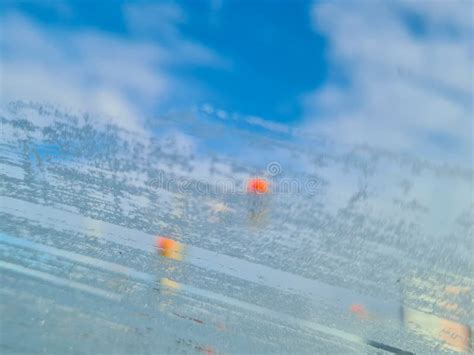 Frost On The Windshield Of The Car While Driving On The Highway