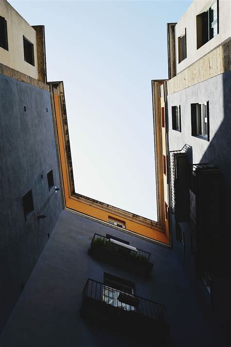 Hd Wallpaper Low Angle Photography Of Gray Concrete Building Worms