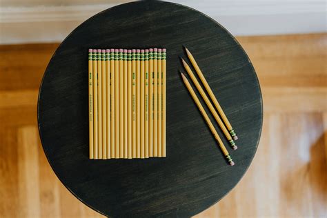 A Black Rectangular Object With A Yellow And Green Design On It Photo
