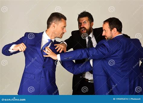 Businessmen Wear Smart Suits And Ties CEOs Fight For Leadership Stock
