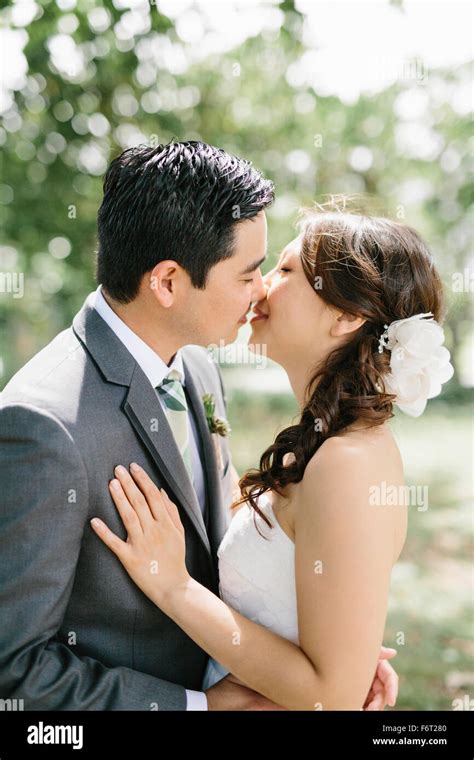 Bride And Groom Kissing Stock Photo Alamy
