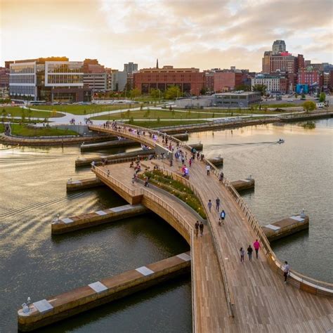 Curved Pedestrian Bridge Links Two Riverfront Parks In Providence