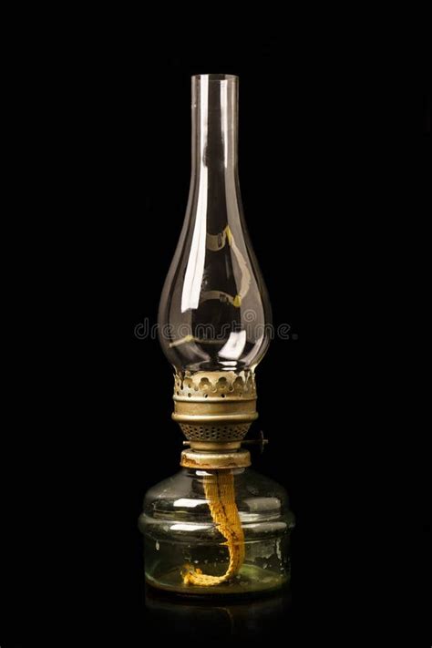 Glowing Antique Old Kerosene Oil Lamp With Vintage Glass Chimney Stock