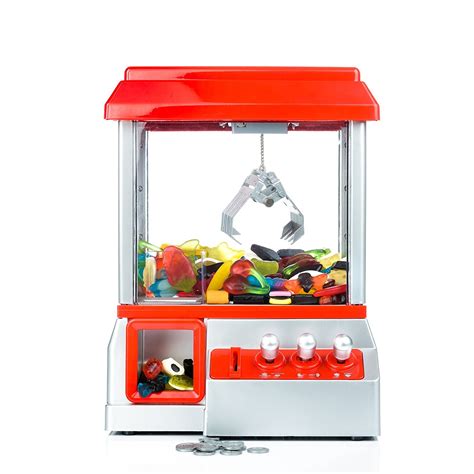 La machine à pince de fête foraine attrape bonbons et jouets Avis