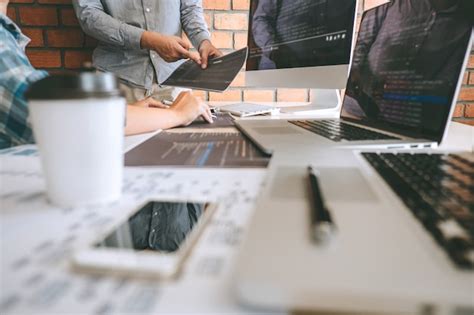 premium photo team of professional developer programmer cooperation