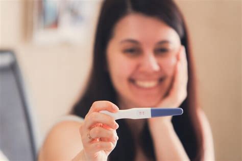 Premium Photo Happy Woman Showing Positive Pregnancy Test Close Up