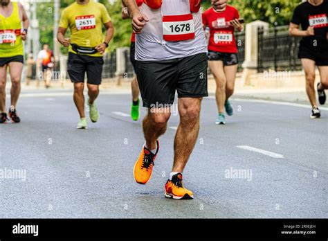 Male Runner Athlete Running Ahead Group Runners Marathon Race Stock