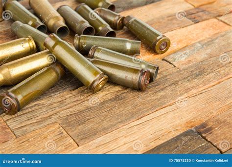 Bullets And Shell Bullets On White Background A Group Of 9mm Bullets