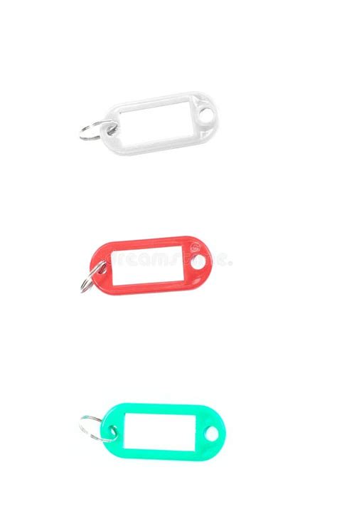 Keychain Plastic Key Holder In Different Colors With White Background And Various Papers And A
