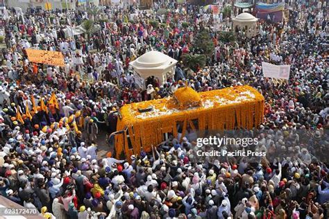 Pakistani And Indian Sikh Devotees Take Part In A Religious Ritual