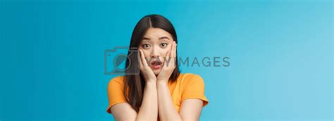 Close Up Concerned Shocked Young Timid Asian Girl Gasping Dropping Jaw