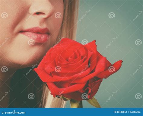 Closeup Woman Holding Red Rose Near Face Stock Image Image Of Model