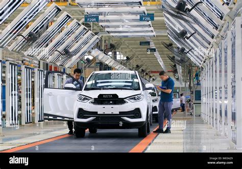Chinese Workers Assemble Neta N01 Electric Vehicles On The Assembly Line At The Auto Plant Of