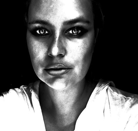 Premium Photo Close Up Portrait Of Woman Against Black Background