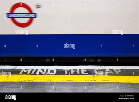 London Uk March 24 2024 Mind The Gap Warning On Platform With Blurred Passing London