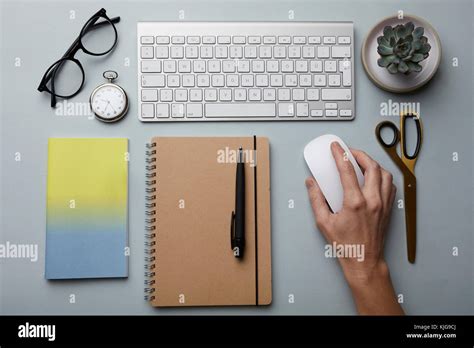 Top View Of Woman Using Computer Mouse On Desk Stock Photo Alamy