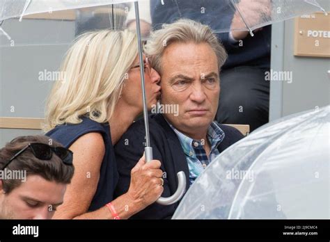 Karine Paschal And Husband Gilles Cohen In The Stands During Roland Garros 2022 On May 22 2022