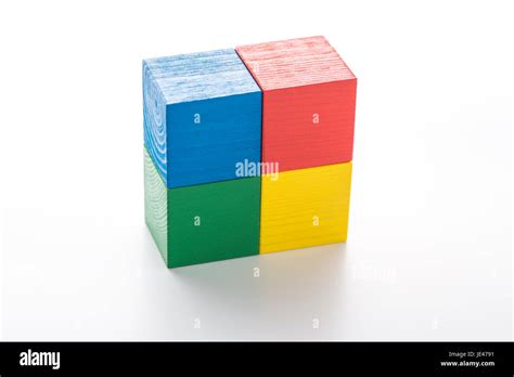 Stack Of Four Colorful Cubes Isolated On White Background Stock Photo Alamy