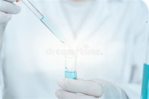 Scientist Analyze Biochemical Samples In Advanced Scientific Laboratory