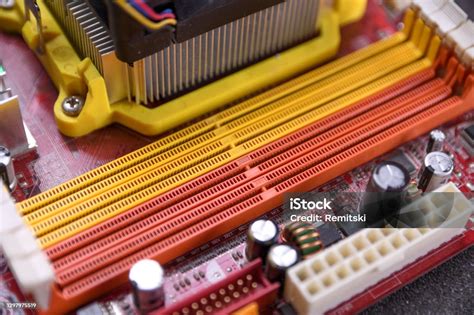 Computer Motherboard And Electronical Components Cpu Gpu Memory And Different Sockets For Video