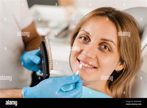 Teeth Color Shades Guide Close Up With Woman Patient Tooth Whitening