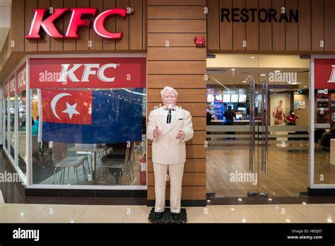 A Kentucky Fried Chicken Restaurant In Johor Bahru Malaysia A Flag Of The State Of Johor Can