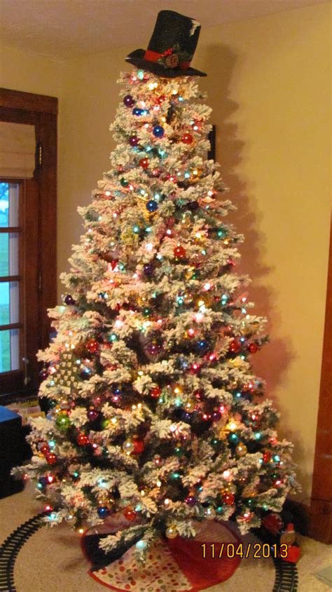 Flock Tree With Colored Lights Christmas Tree With Coloured Lights