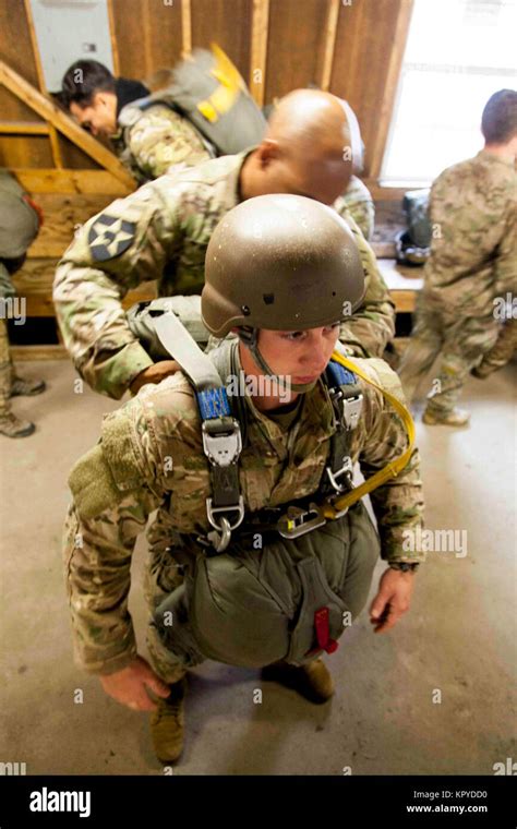 A U S Army Paratrooper Receives Jumpmaster Personnel Inspection During
