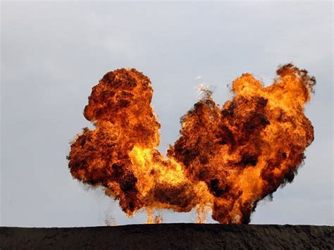 Photos Of Terrible Explosions Frozen Serenely In Mid Air