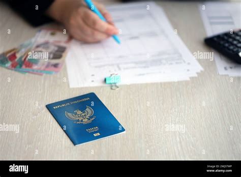 Indonesia Passport And Service Workers Table On Process Of Citizenship Registration Female