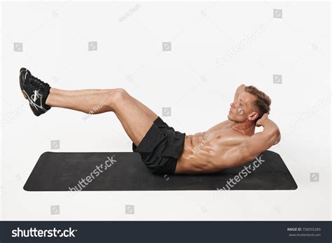 Handsome Barechested Man Lying On Stretching Stock Photo 758055289