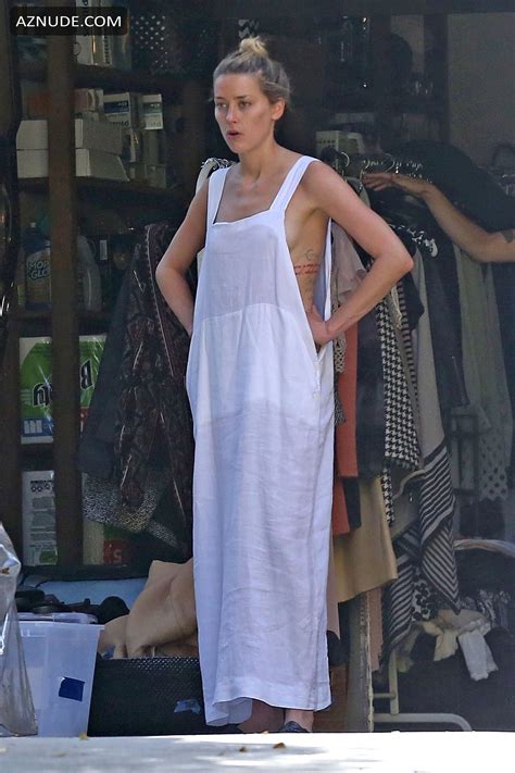 Amber Heard Nip Slip Exposes Boob While Cleaning Out Her Garage In La