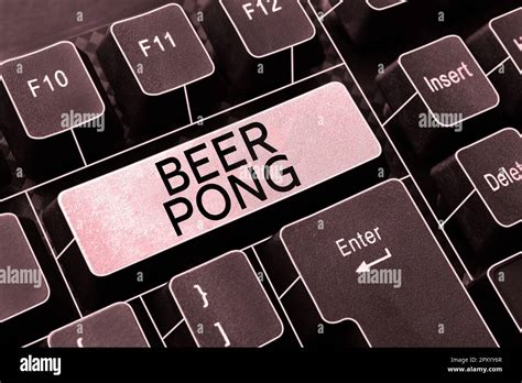 Hand Writing Sign Beer Pong Word Written On A Game With A Set Of Beer Containing Cups And