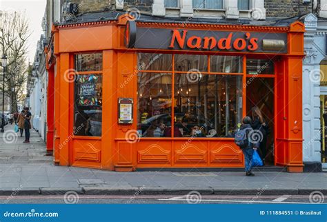 Exterior Of Nando`s Flame Grilled Periperi Chicken Restaurant In Earl`s